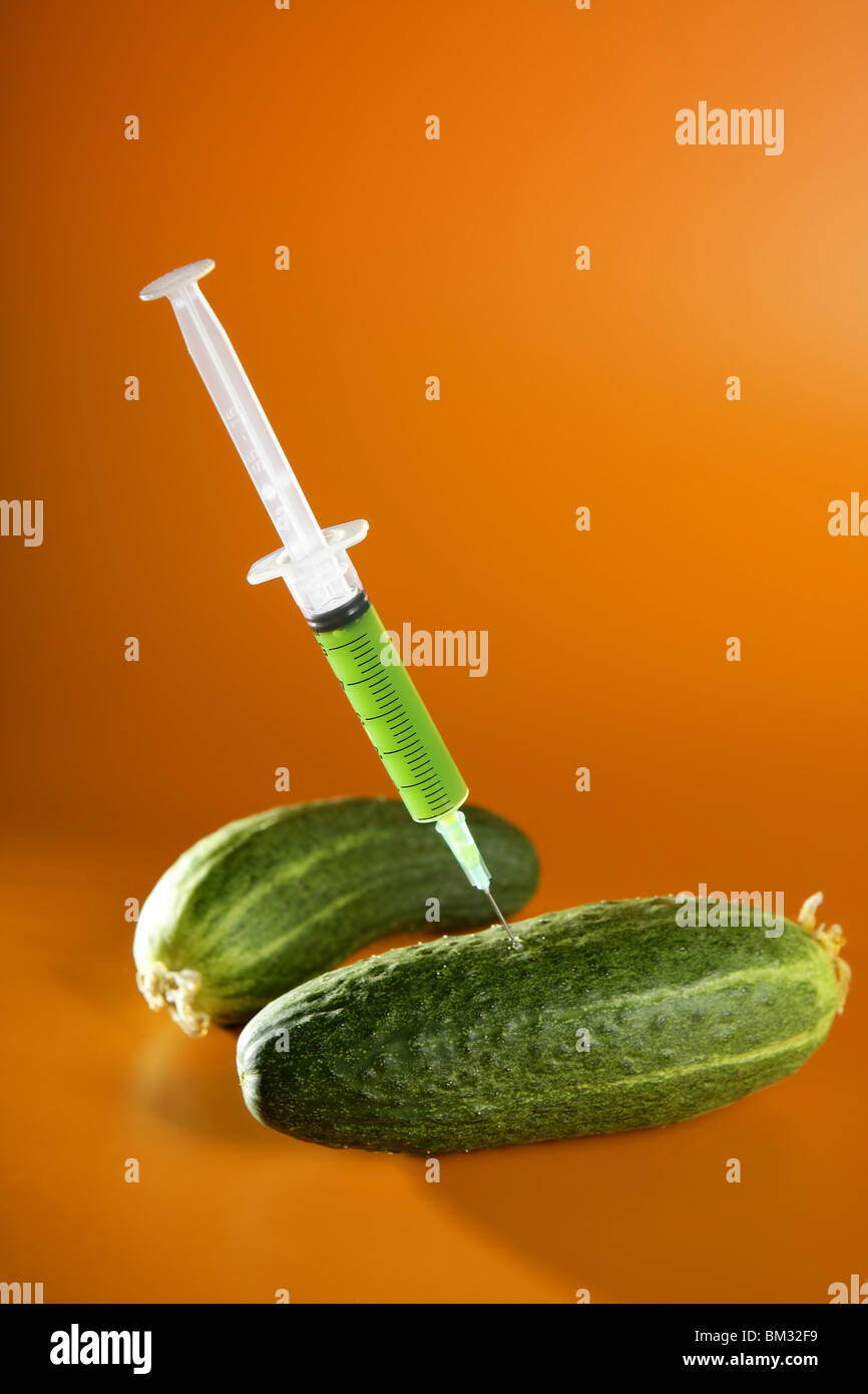 Bio genetics research of food , modified cucumber with syringe Stock ...