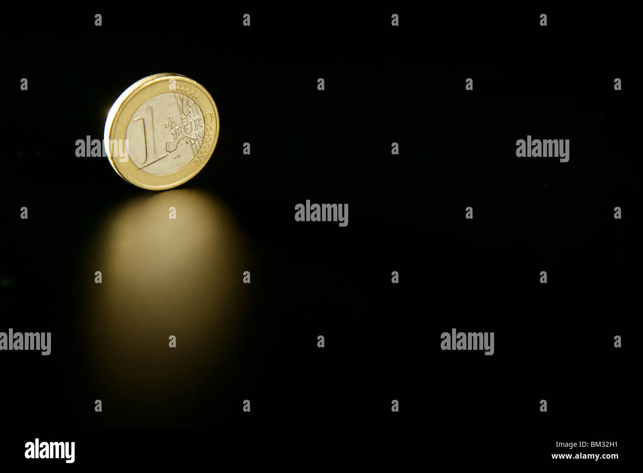 Euro currency coin macro with reflection over black background Stock ...
