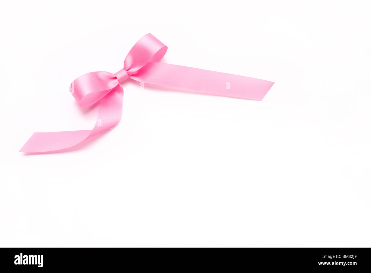 Pink ribbon, white background, copy space Stock Photo - Alamy