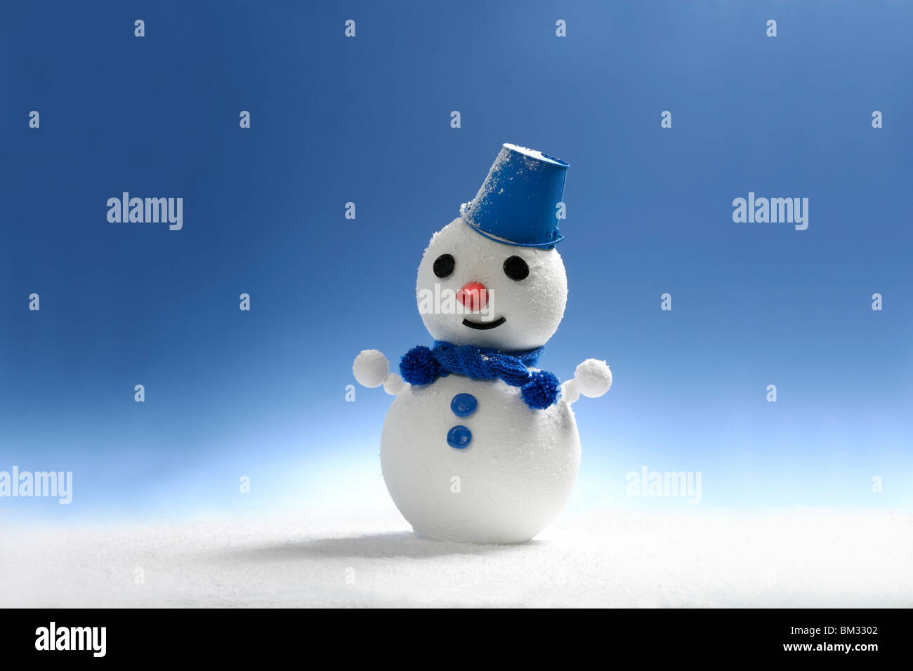 Snowman Wearing Blue Stock Photo - Alamy