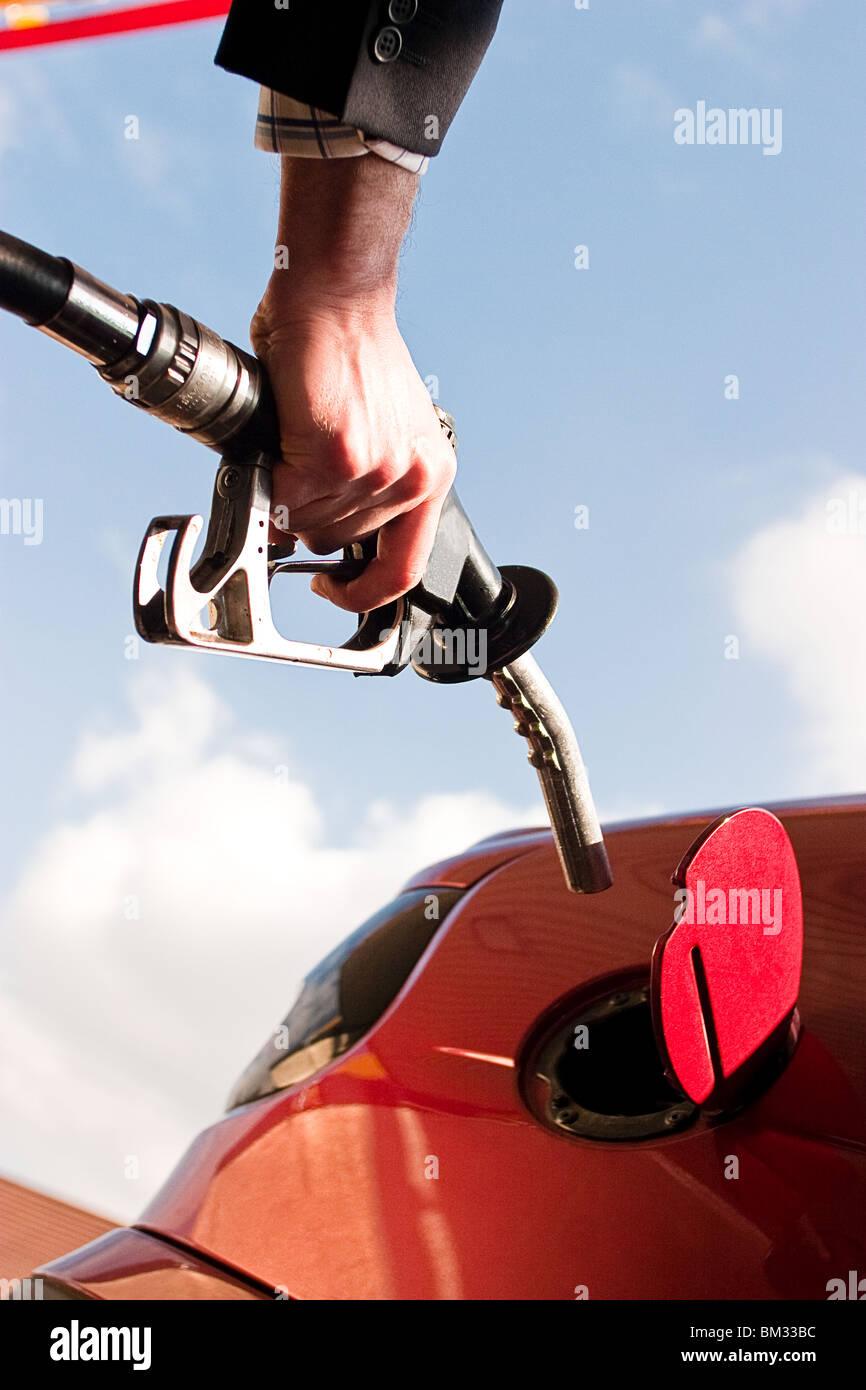 Driver filling up hi-res stock photography and images - Alamy