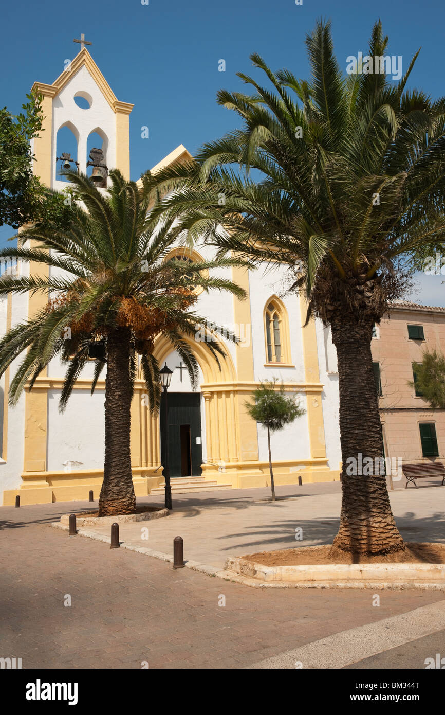 Detail of church in Saint Climent, Menorca, with palm trees in the ...