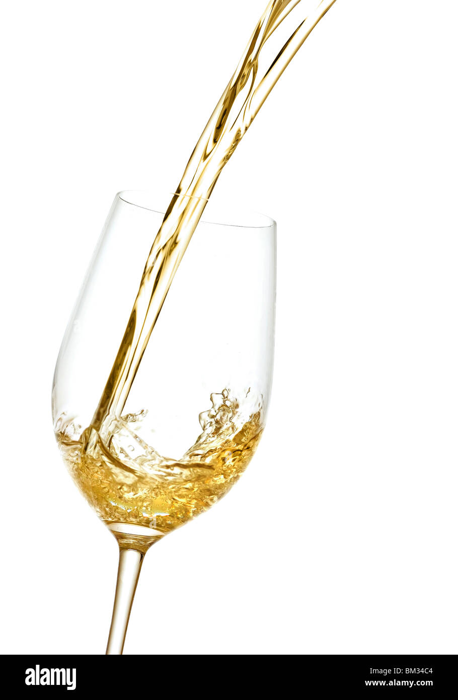 White wine pouring Stock Photo - Alamy