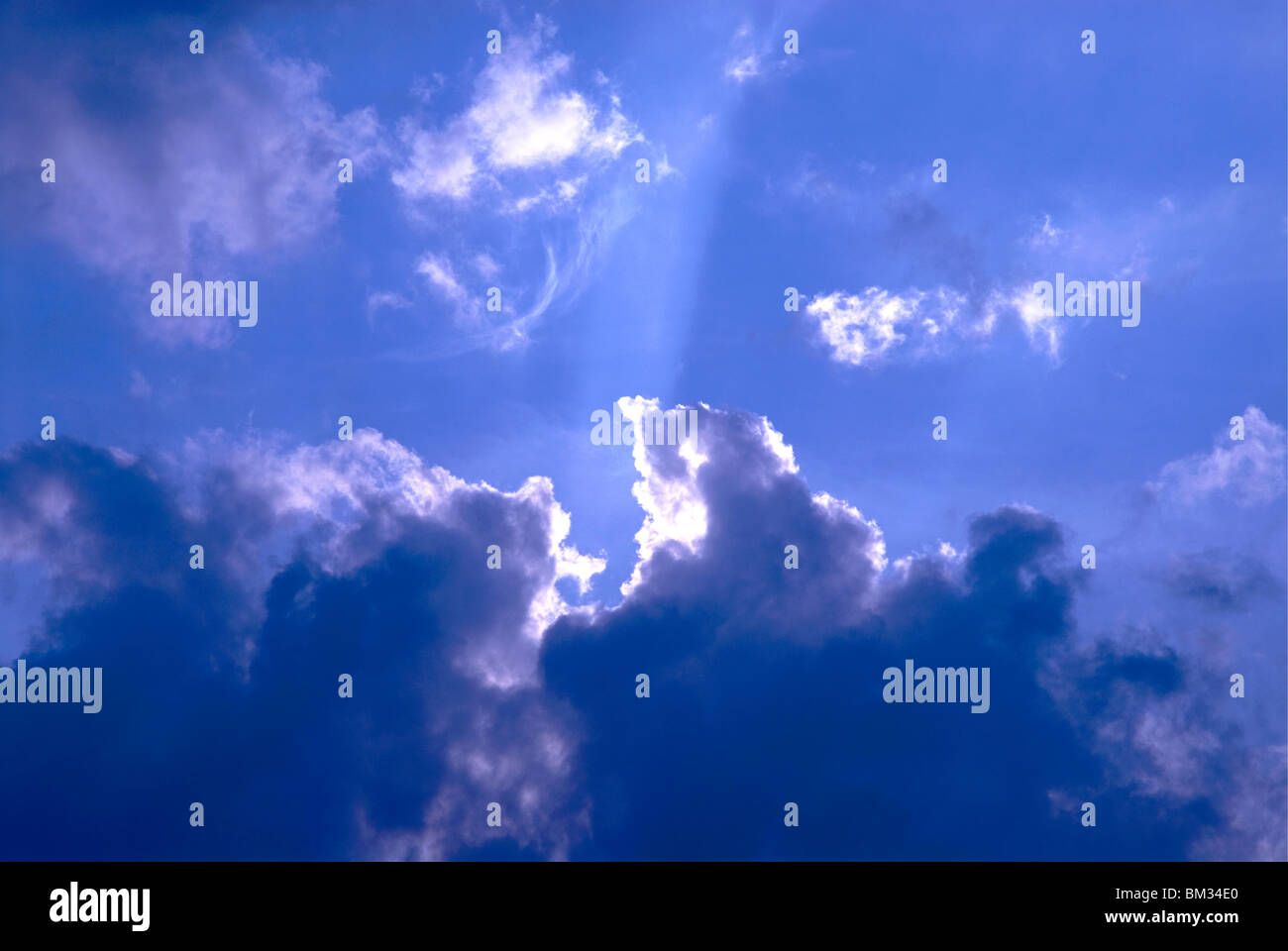 Clouds and sunbeam in sky Stock Photo - Alamy