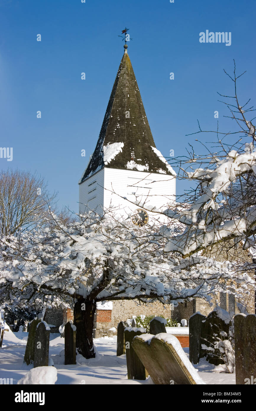 St.Nicolas Church and churchyard, Great Bookham, Surrey in snow Stock ...