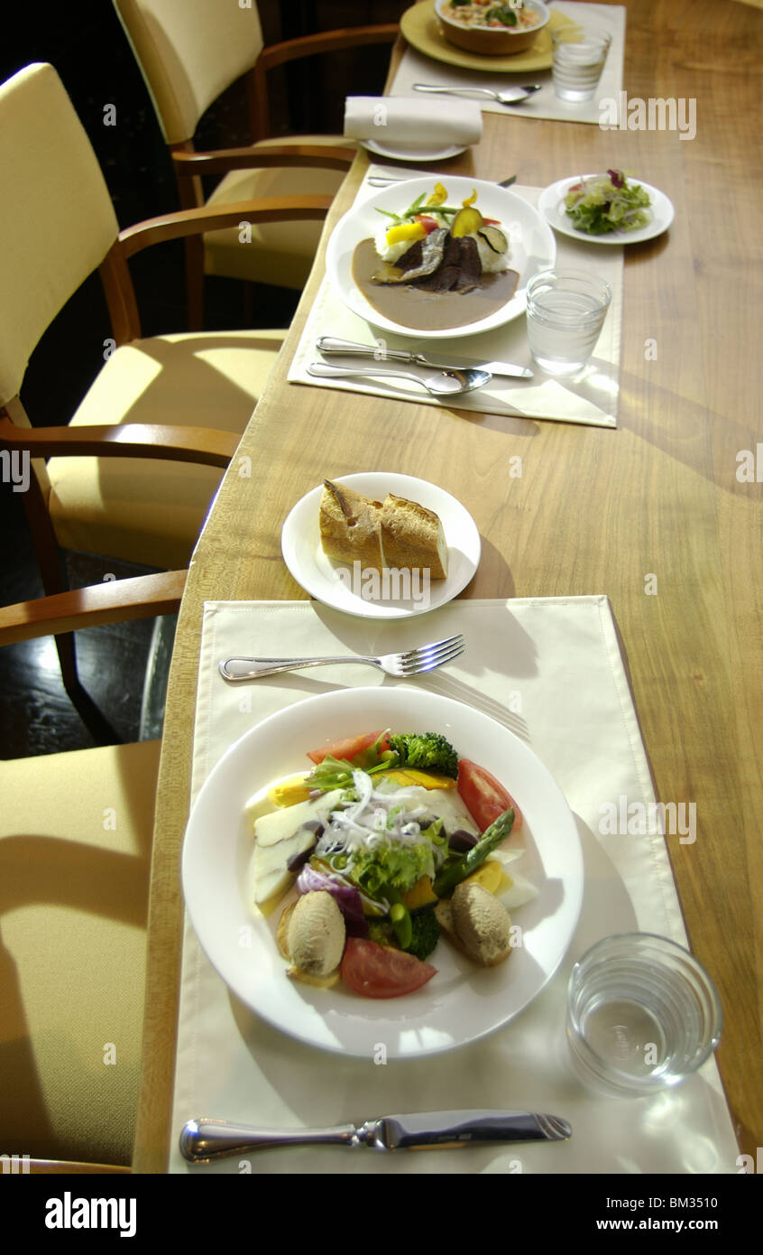 Lunch on dining table Stock Photo - Alamy