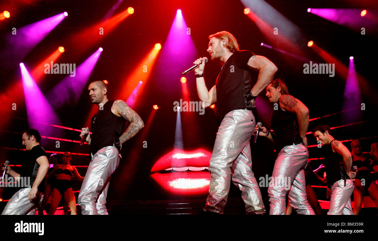 boyzone perform onstage during the first night of their comeback tour ...