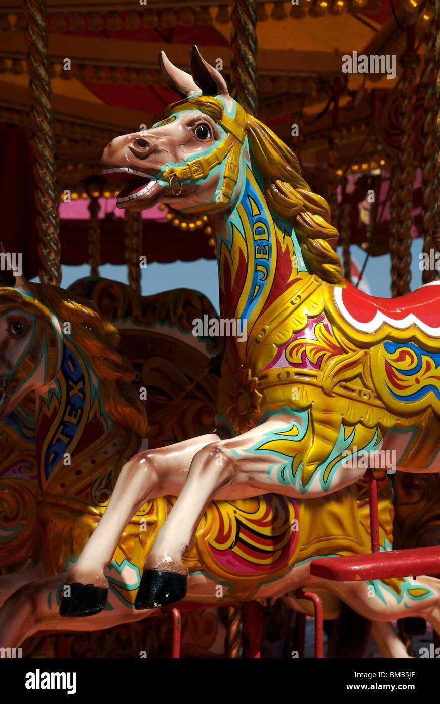 Colourful fairground horse ride, Plymouth, Devon, UK Stock Photo - Alamy