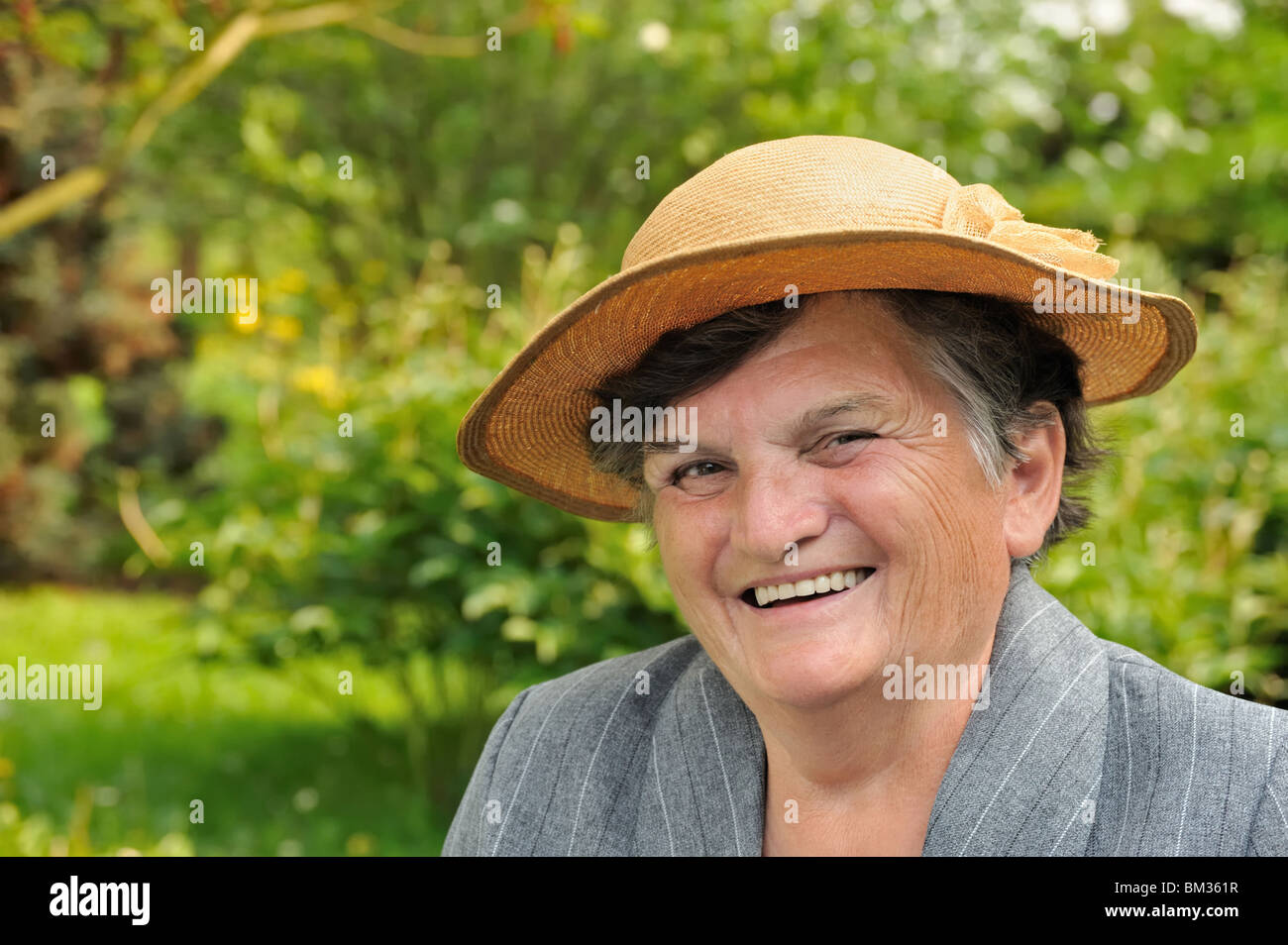 Senior woman smiling - portrait - outdoor Stock Photo - Alamy