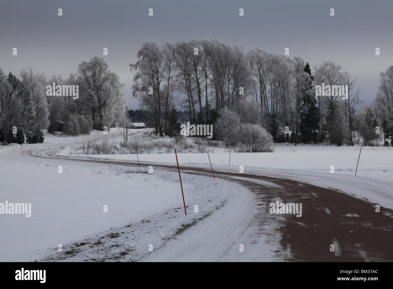 TWISTING LONG WINDING ROAD DEEP WINTER: Twisting road through country ...