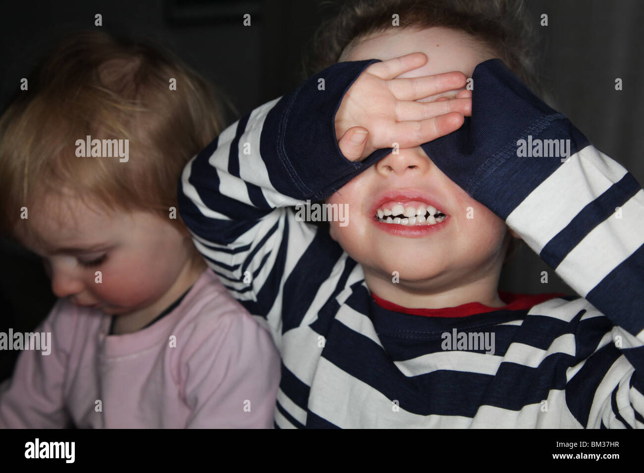 Boy peek a boo hi-res stock photography and images - Alamy