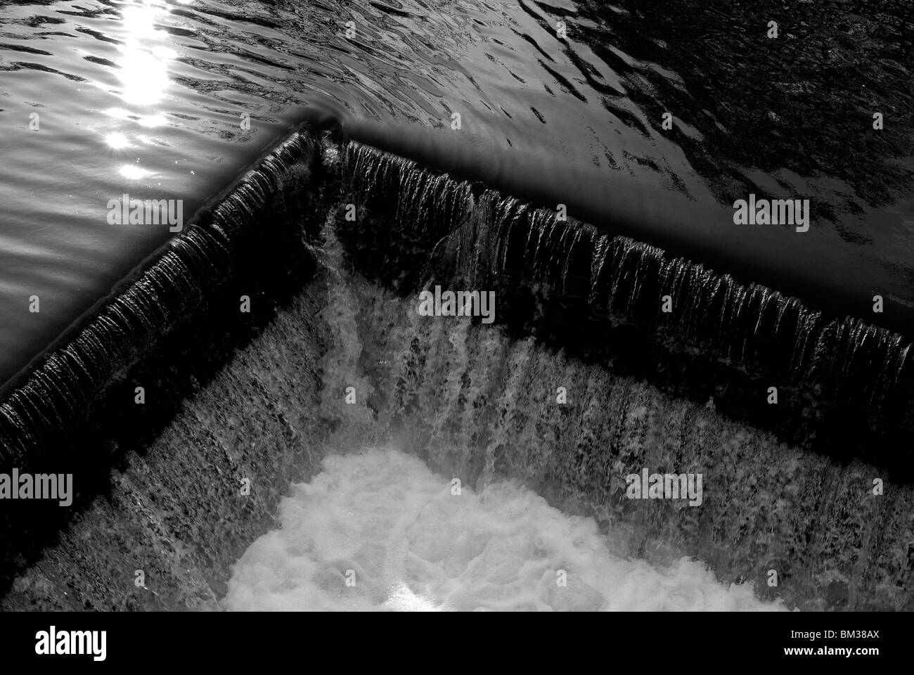 Water falling over Weir Stock Photo - Alamy
