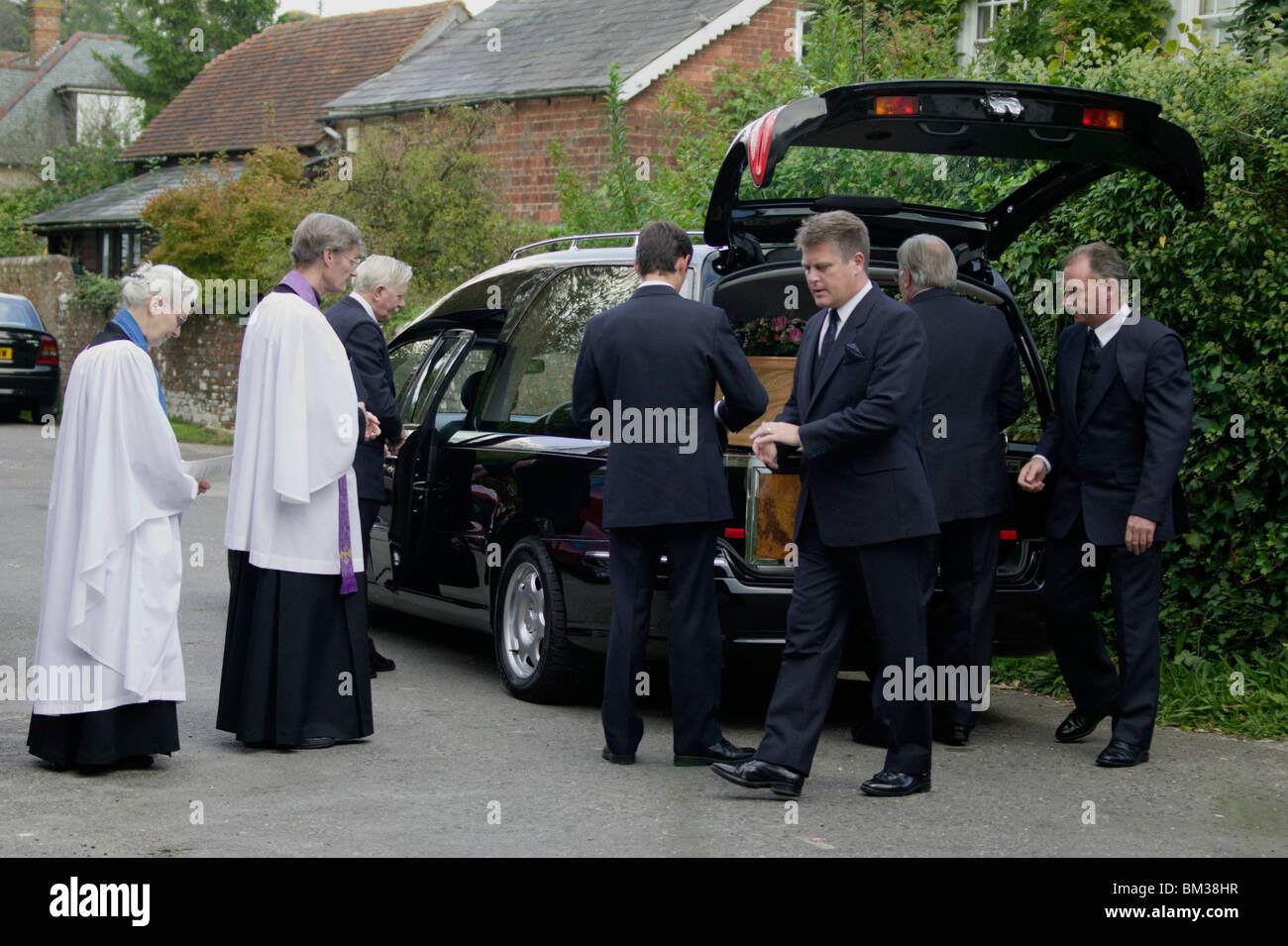 undertakers with black hearse Stock Photo - Alamy