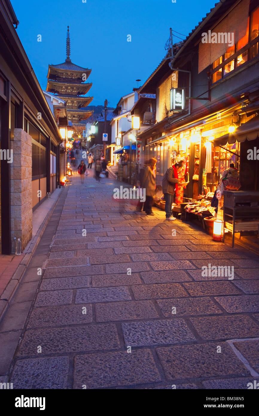 Night View of Shops in Alley Stock Photo - Alamy