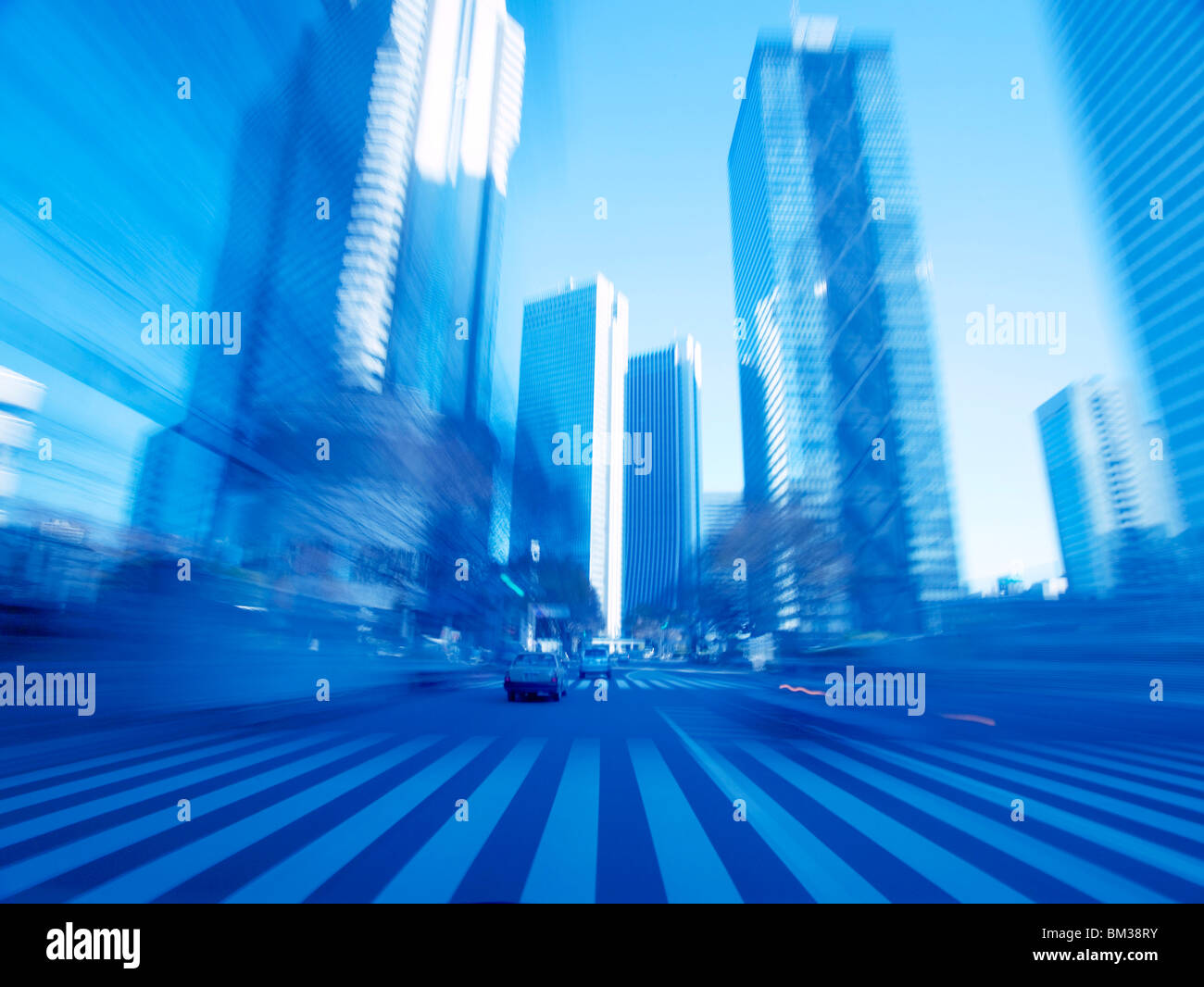 Driveway and office buildings, toned image, blurred motion, Shinjuku ...