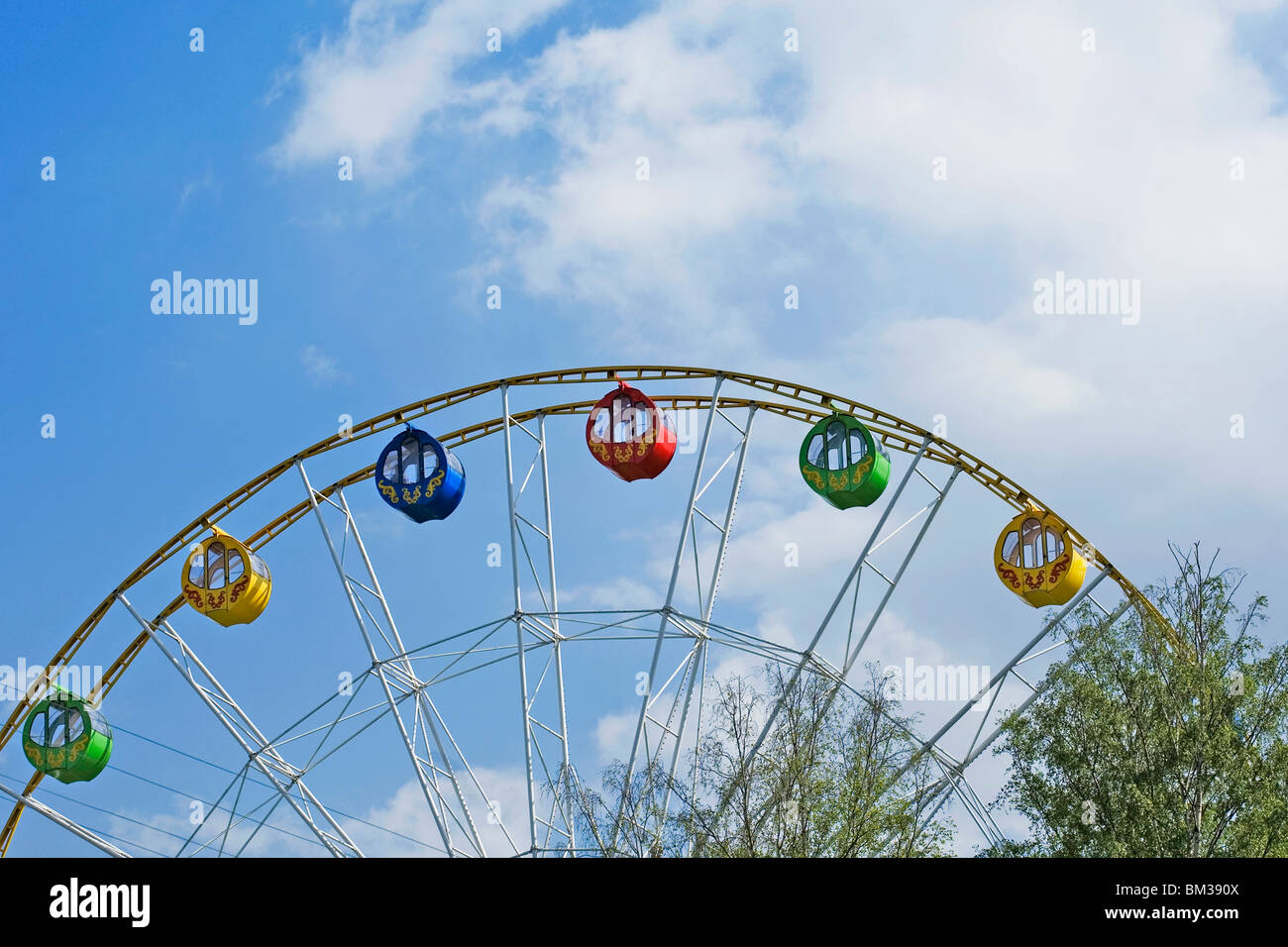 observation wheel in park over blue sky Stock Photo - Alamy