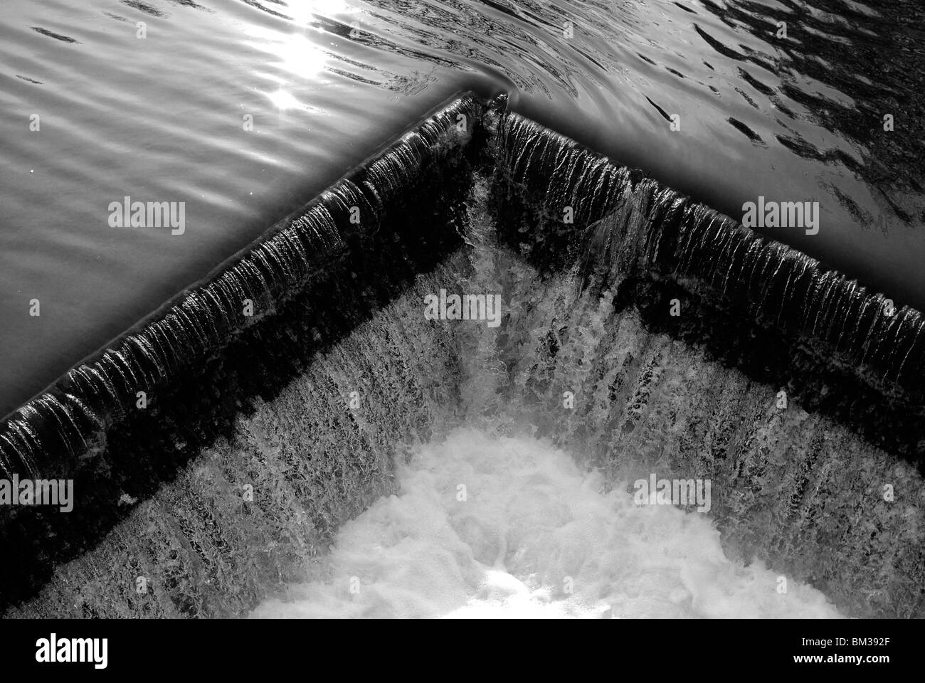 Water falling over Weir Stock Photo - Alamy