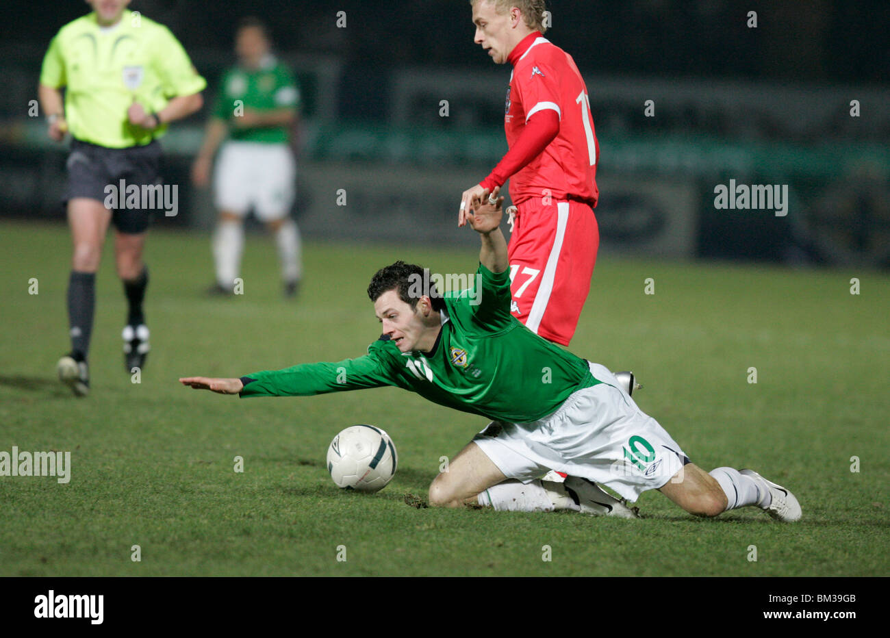 Ivan sproule goes to ground under a tackle from david coterill at an ...