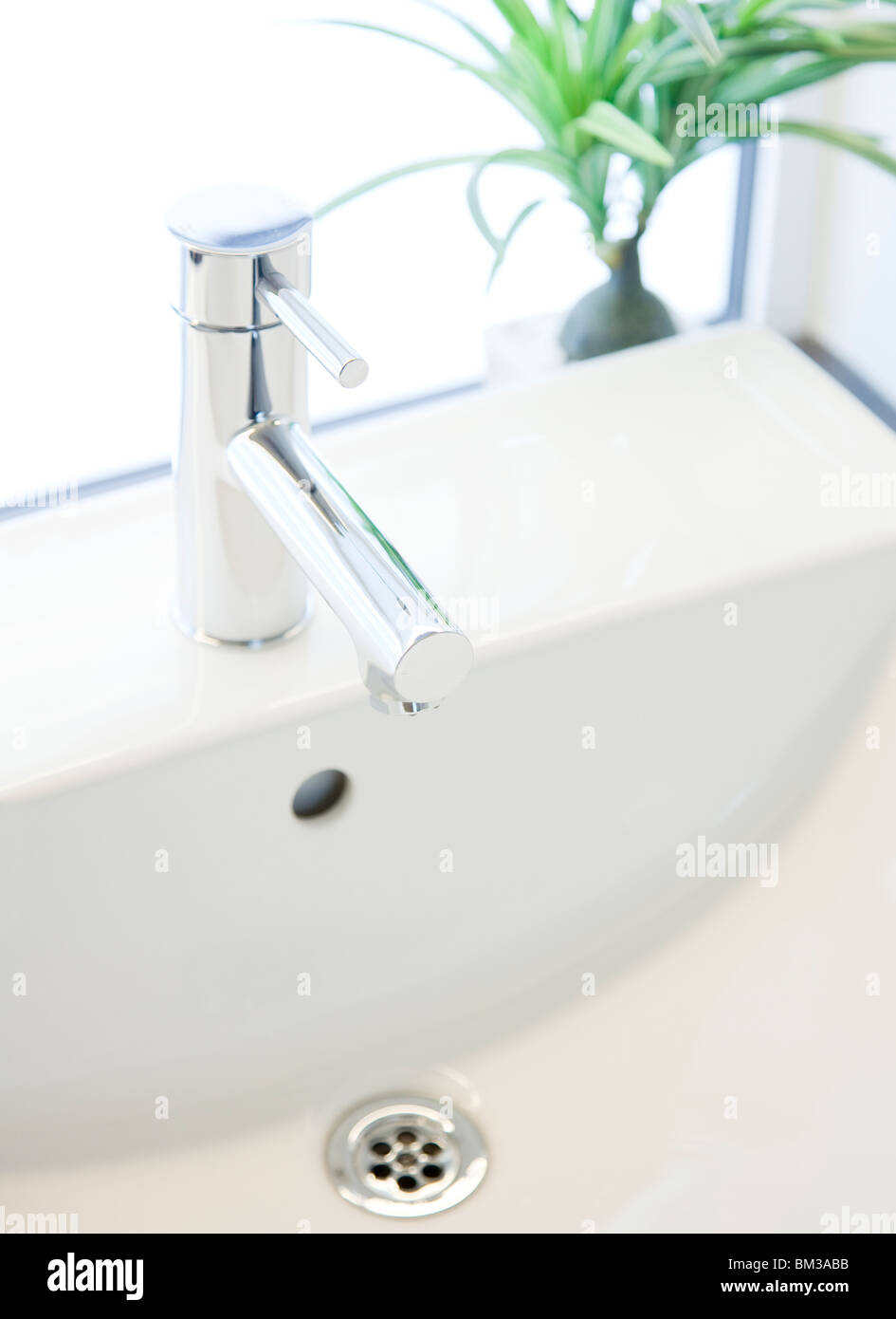 Closeup modern bathroom sinks hi-res stock photography and images - Alamy