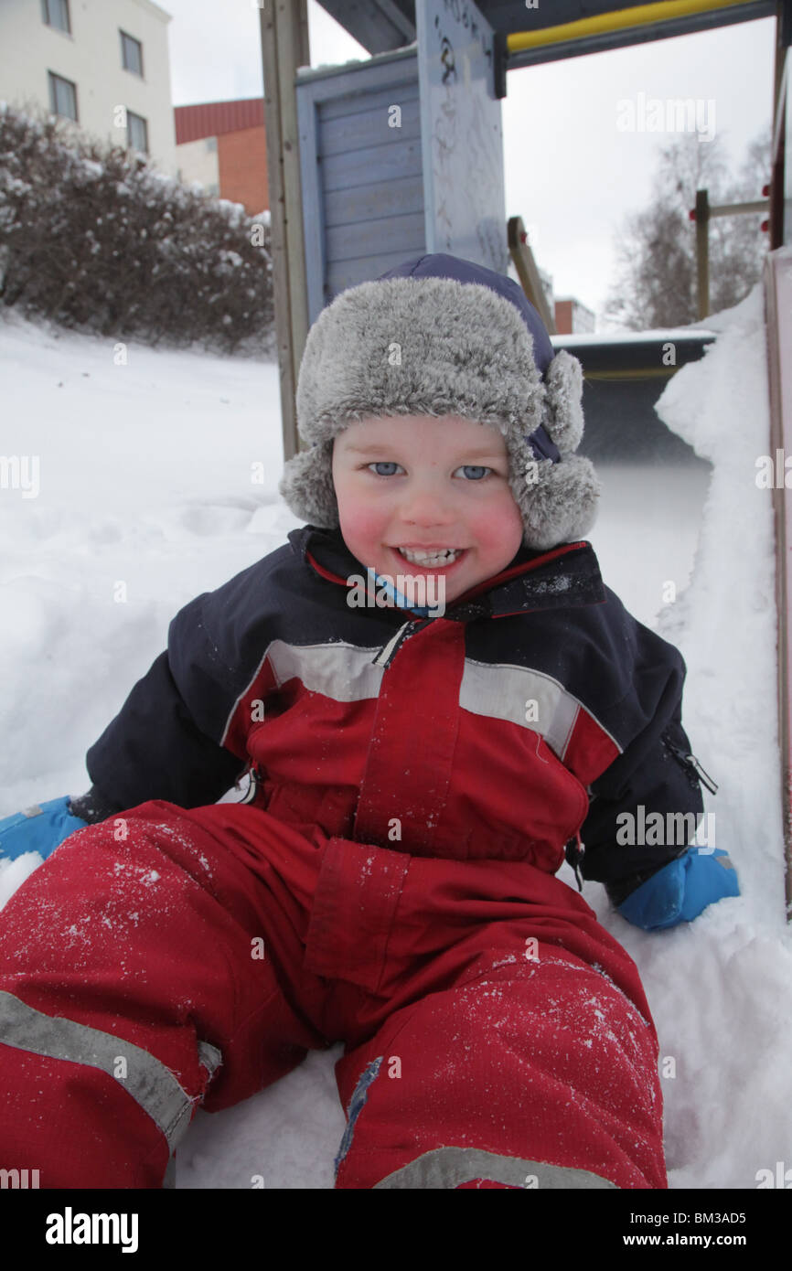 Baby on slide hi-res stock photography and images - Alamy