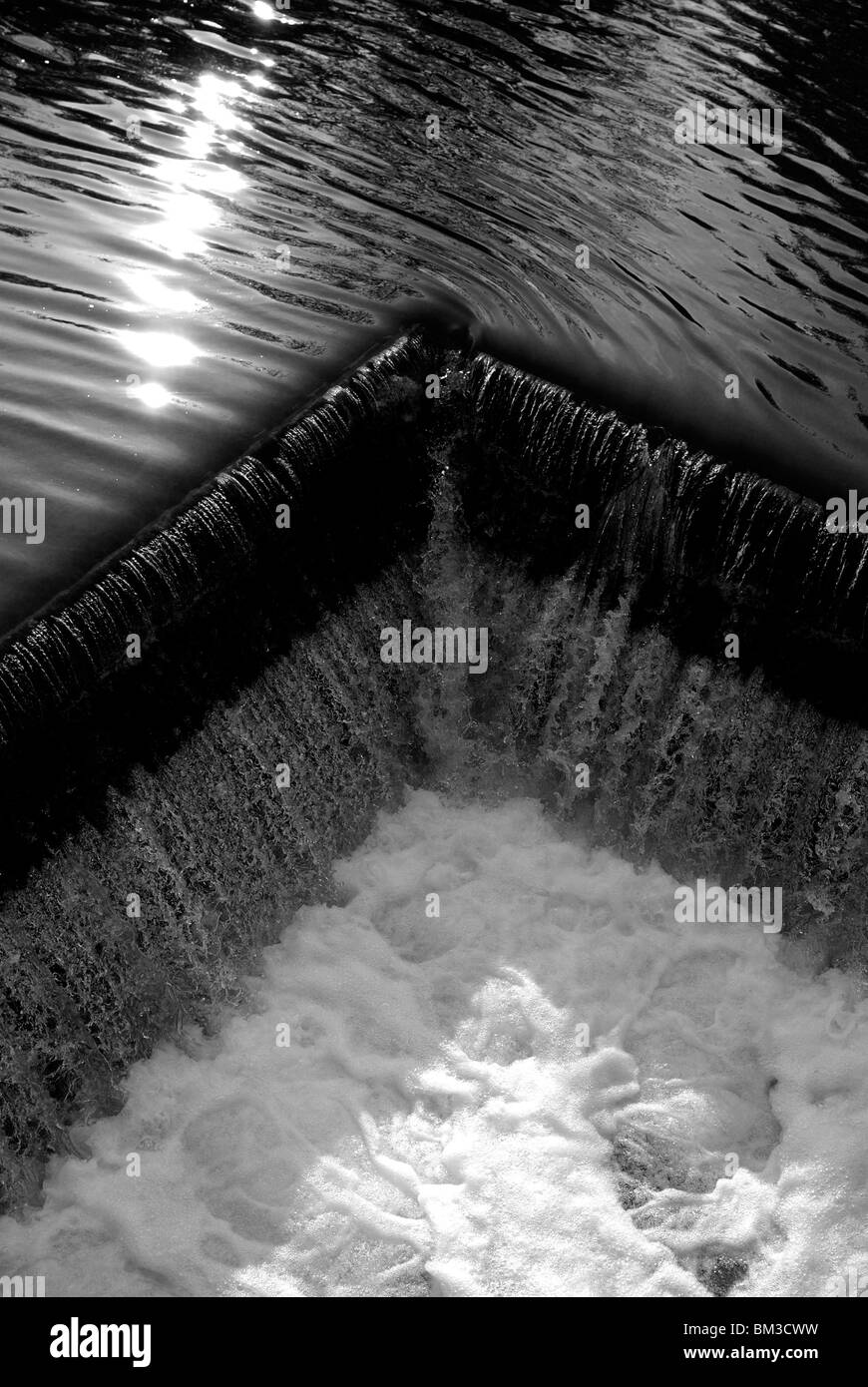 Water falling over Weir Stock Photo - Alamy