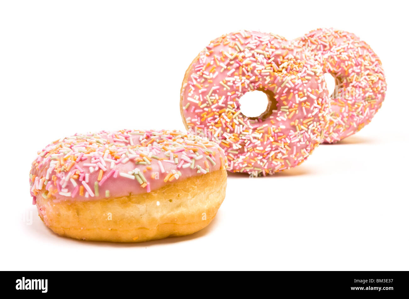 Pink iced donut hi-res stock photography and images - Alamy