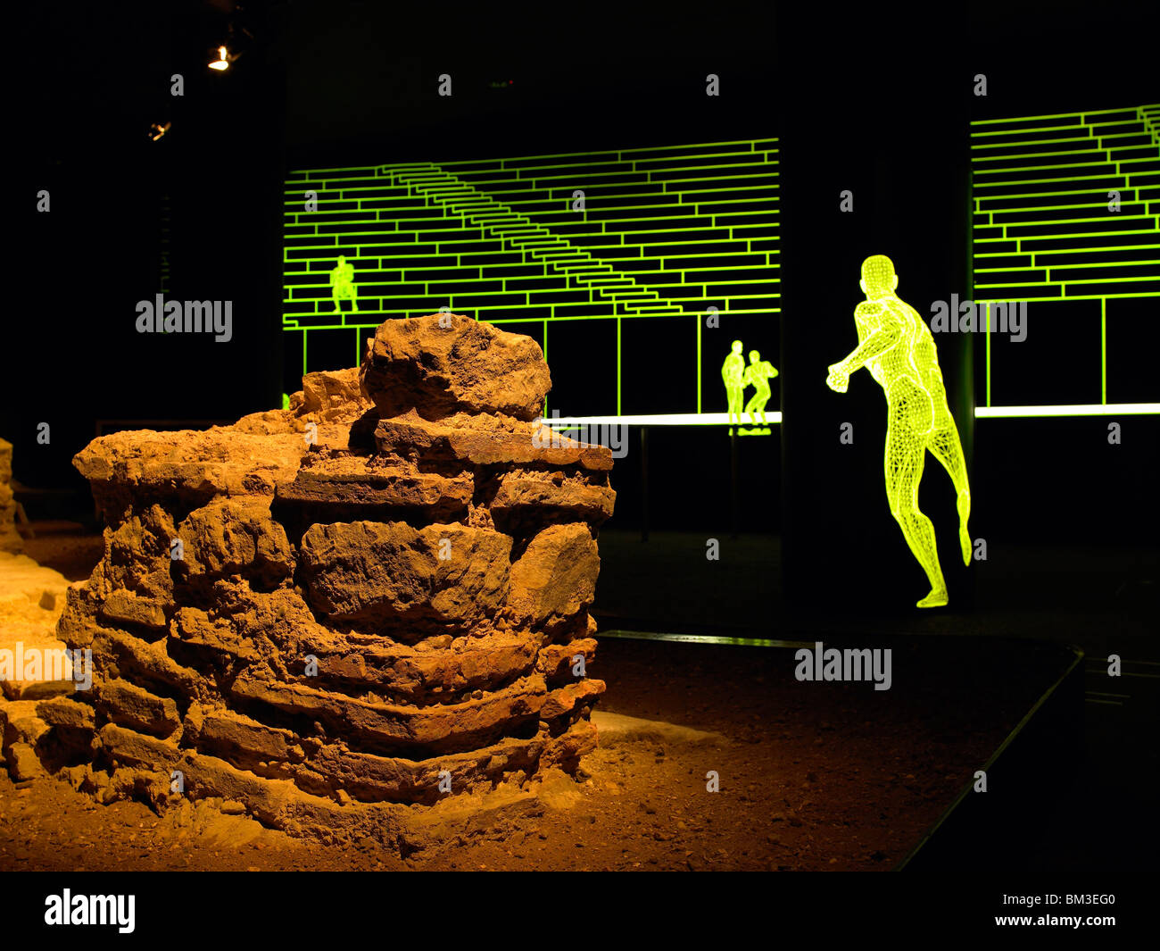 neon figures in a roman underground display featuring remains of ...