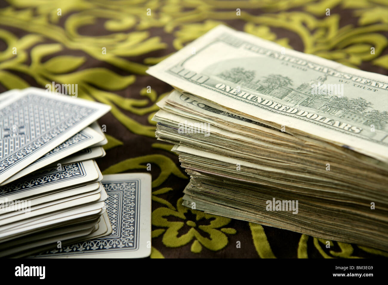 dollar notes and poker cards, gambler tools recreation Stock Photo - Alamy