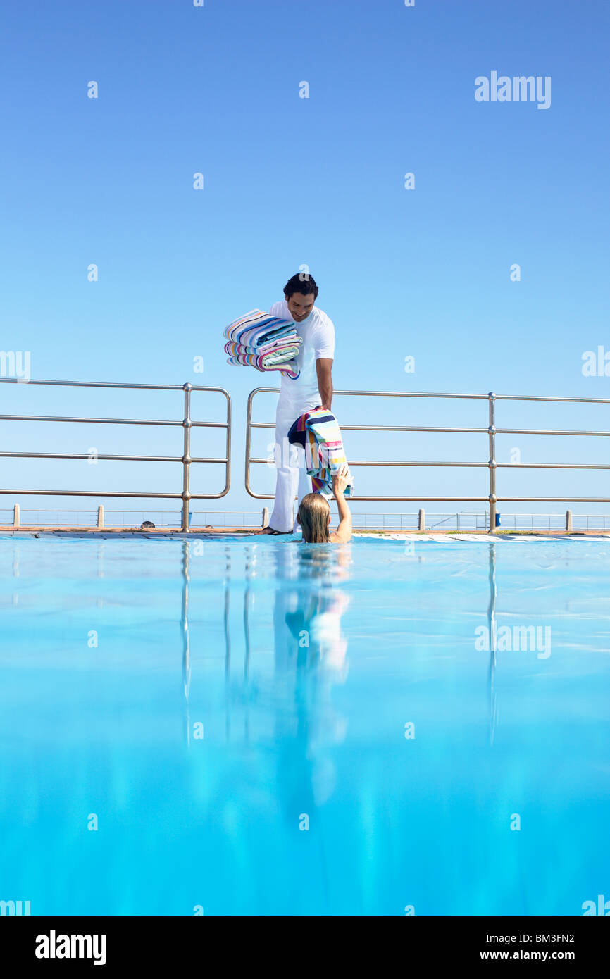 Man standing poolside rear view hi-res stock photography and images - Alamy