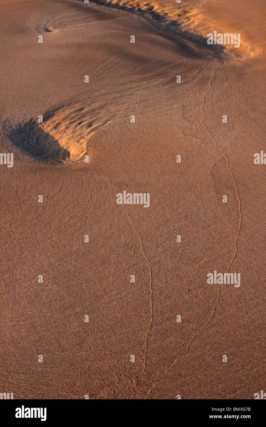 Wave shaped sand Stock Photo - Alamy