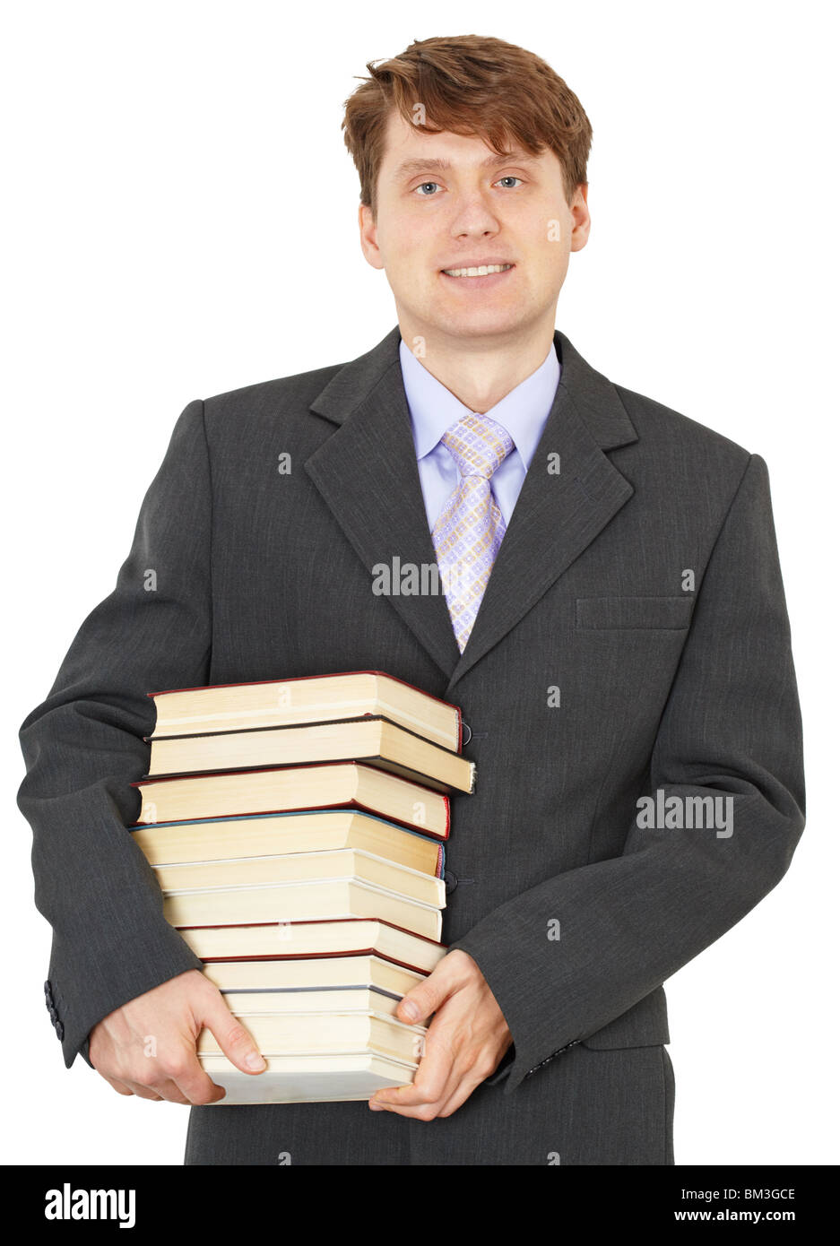 Portrait of the man with the big pile of books isolated on a white ...