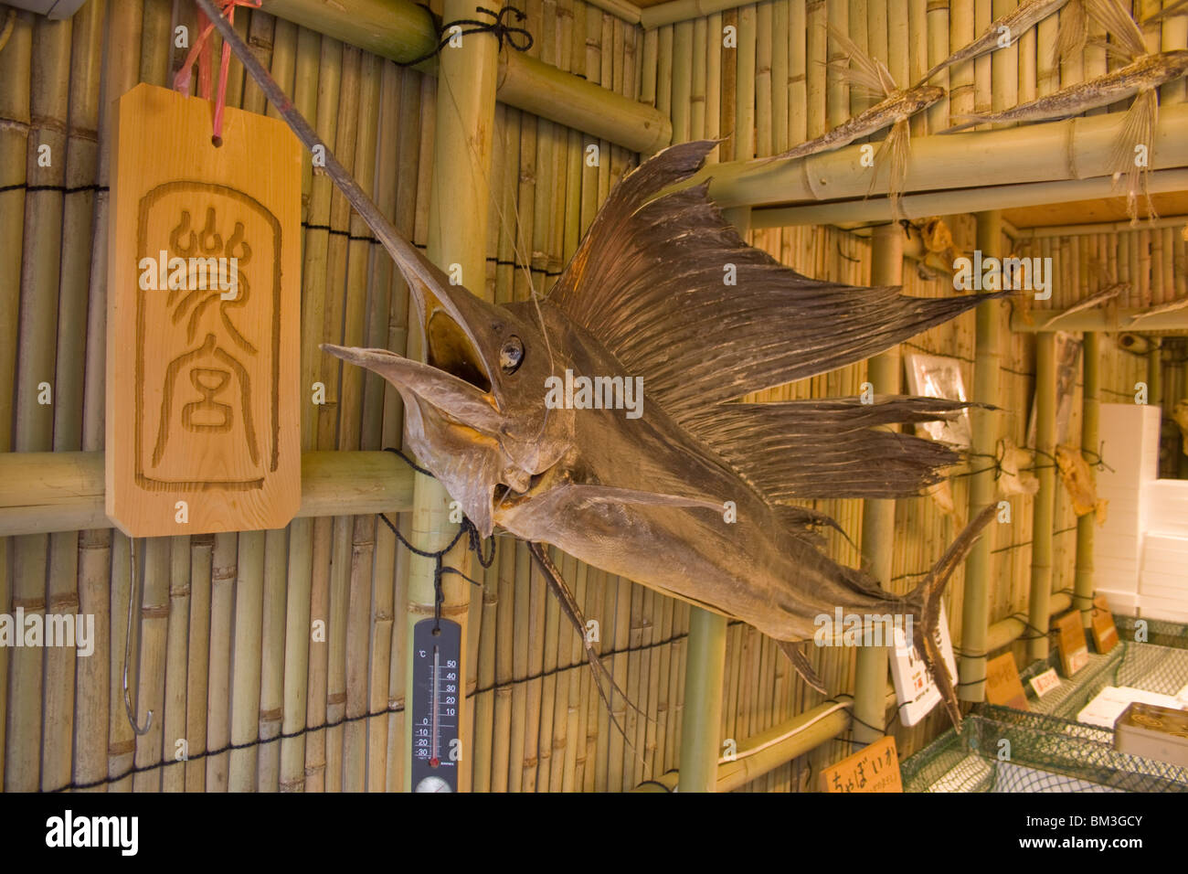 A swordfish hanging up in a seafood shop in the Japanese city of Ise ...