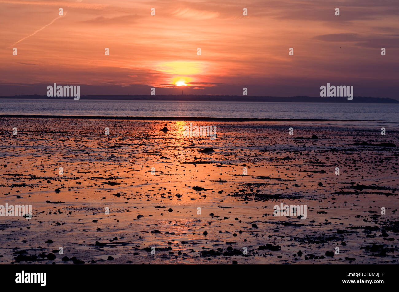 Sunset Whitstable beach kent England Stock Photo - Alamy
