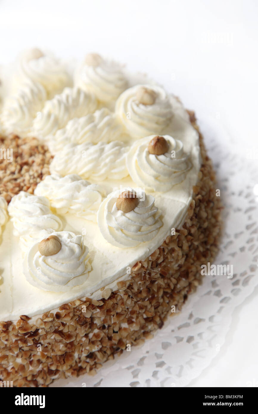 Cream cake with almond edge - close-up Stock Photo - Alamy