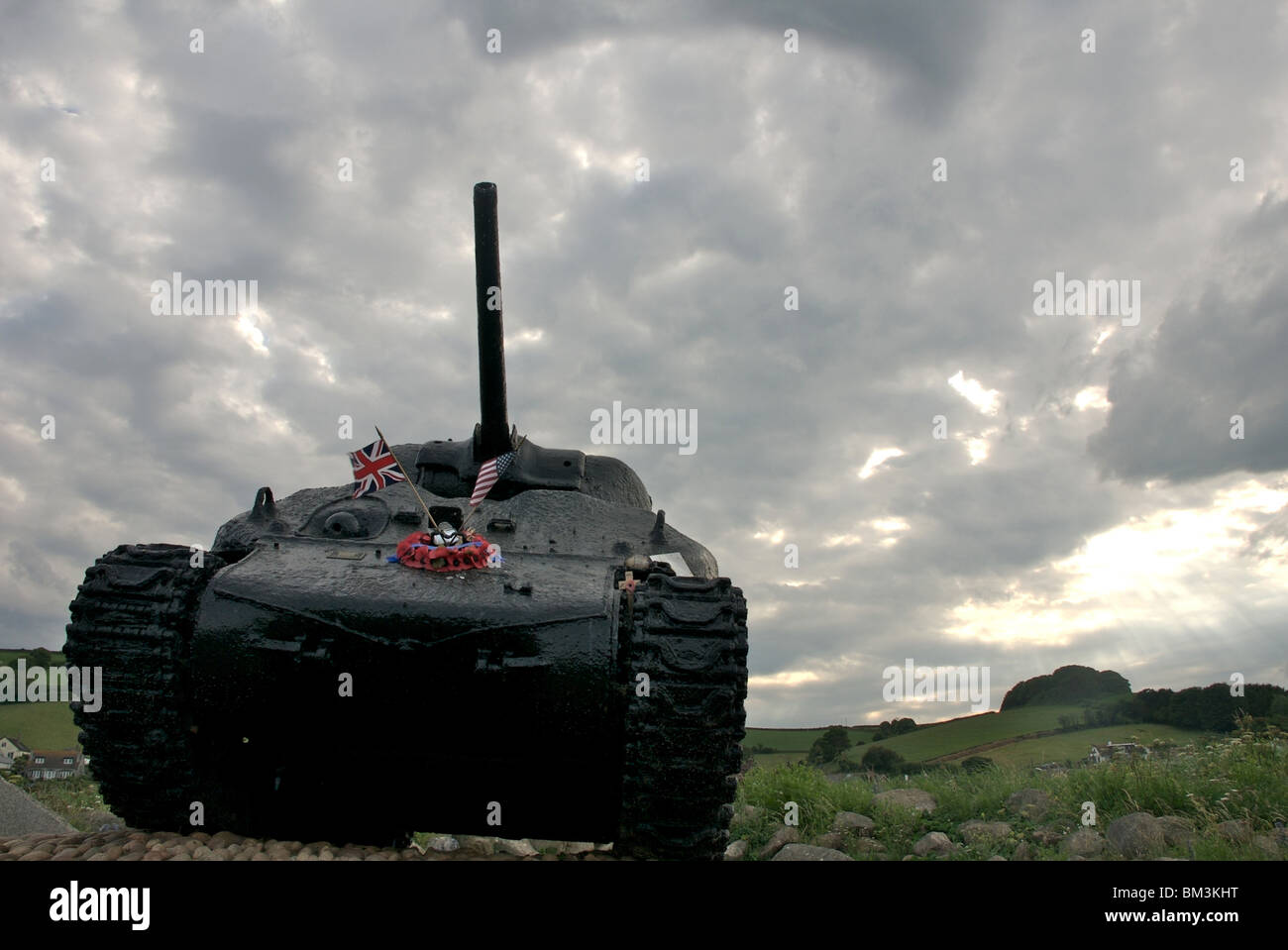 World War Two Sherman tank memorial with sweeping cloud formation ...