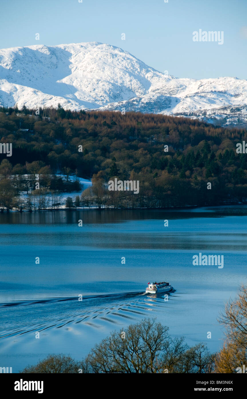 A pleasure boat on Lake Windermere in winter, Lake District, Cumbria ...