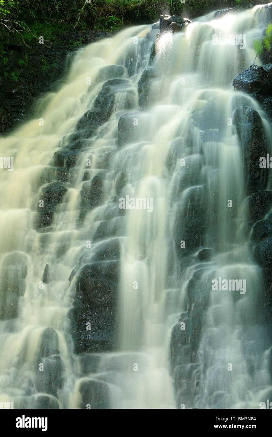 A Close up image of a waterfall with water tumbling over rocks Stock ...