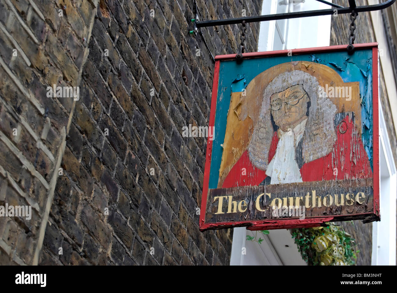 bogus pub sign marking the location of an 18th century courthouse in ...