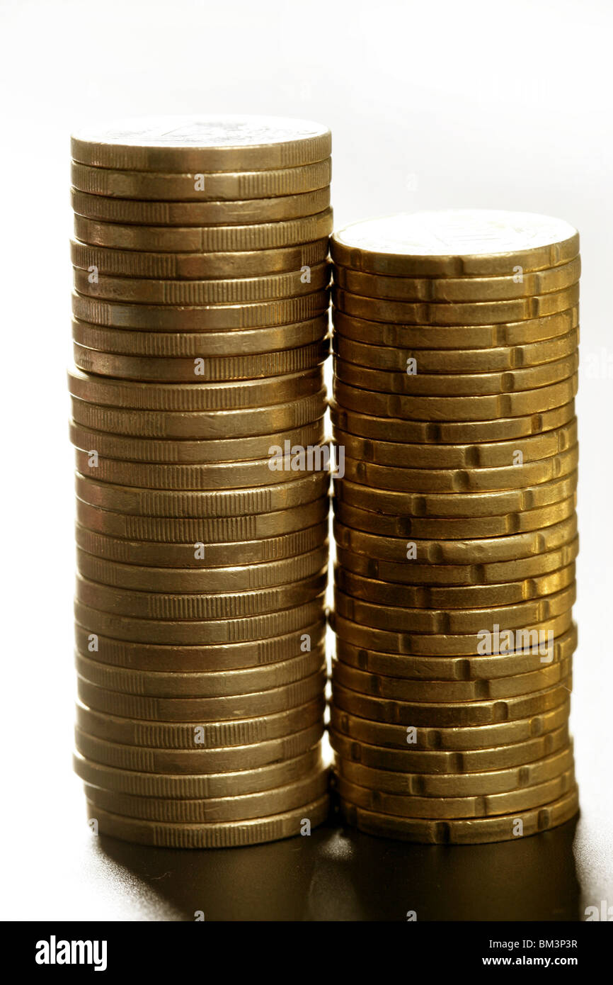 Euro coin columns, golden cash over white background at studio Stock ...