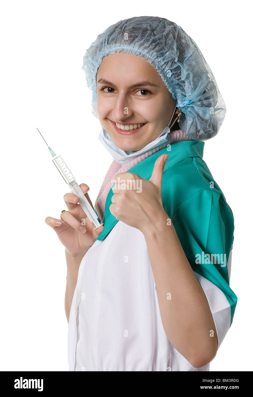 A smiling doctor with full syringe shows ok Stock Photo - Alamy