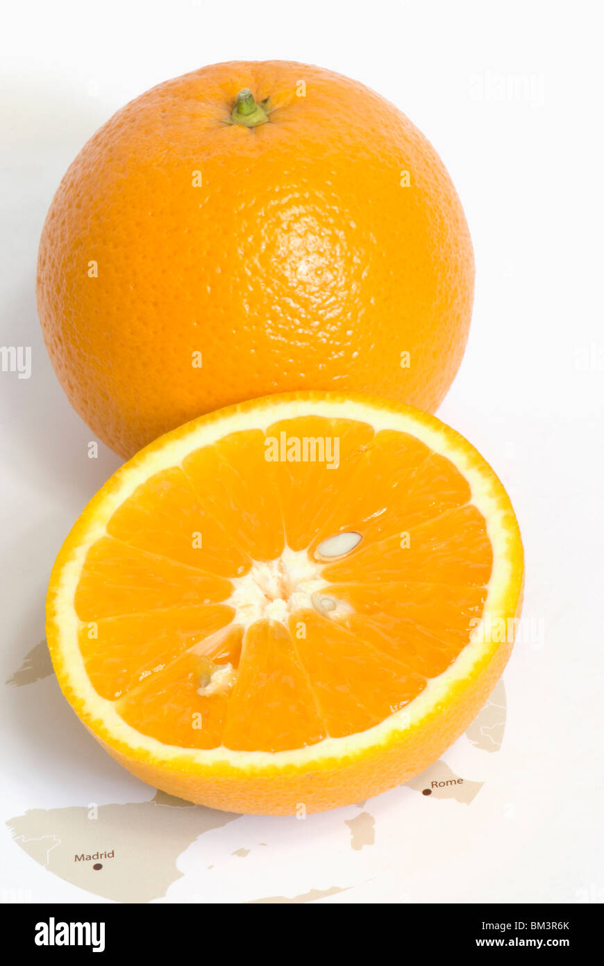 Orange fruit on the map background Stock Photo - Alamy