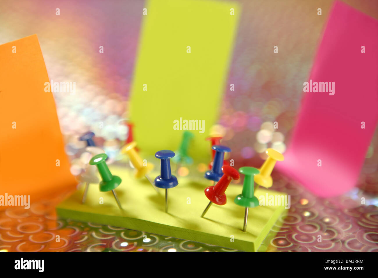 adhesive color notes with colorful pin over holographic background ...