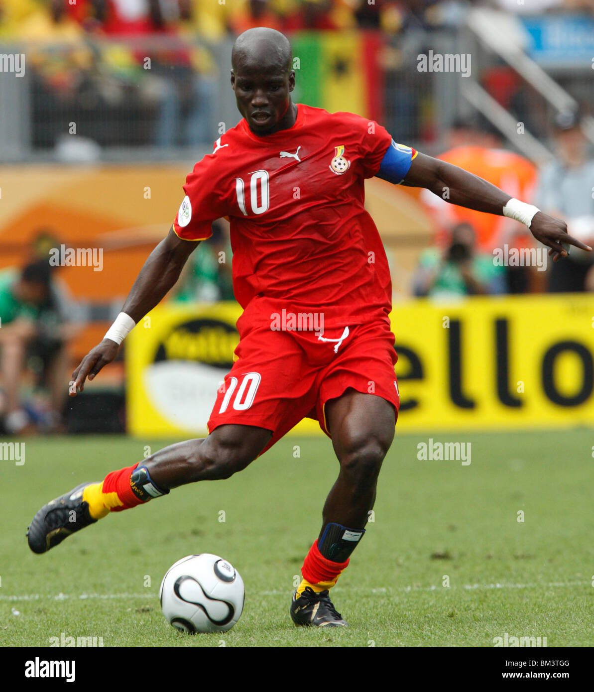 Stephen Appiah of Ghana passes the ball during a FIFA World Cup match ...