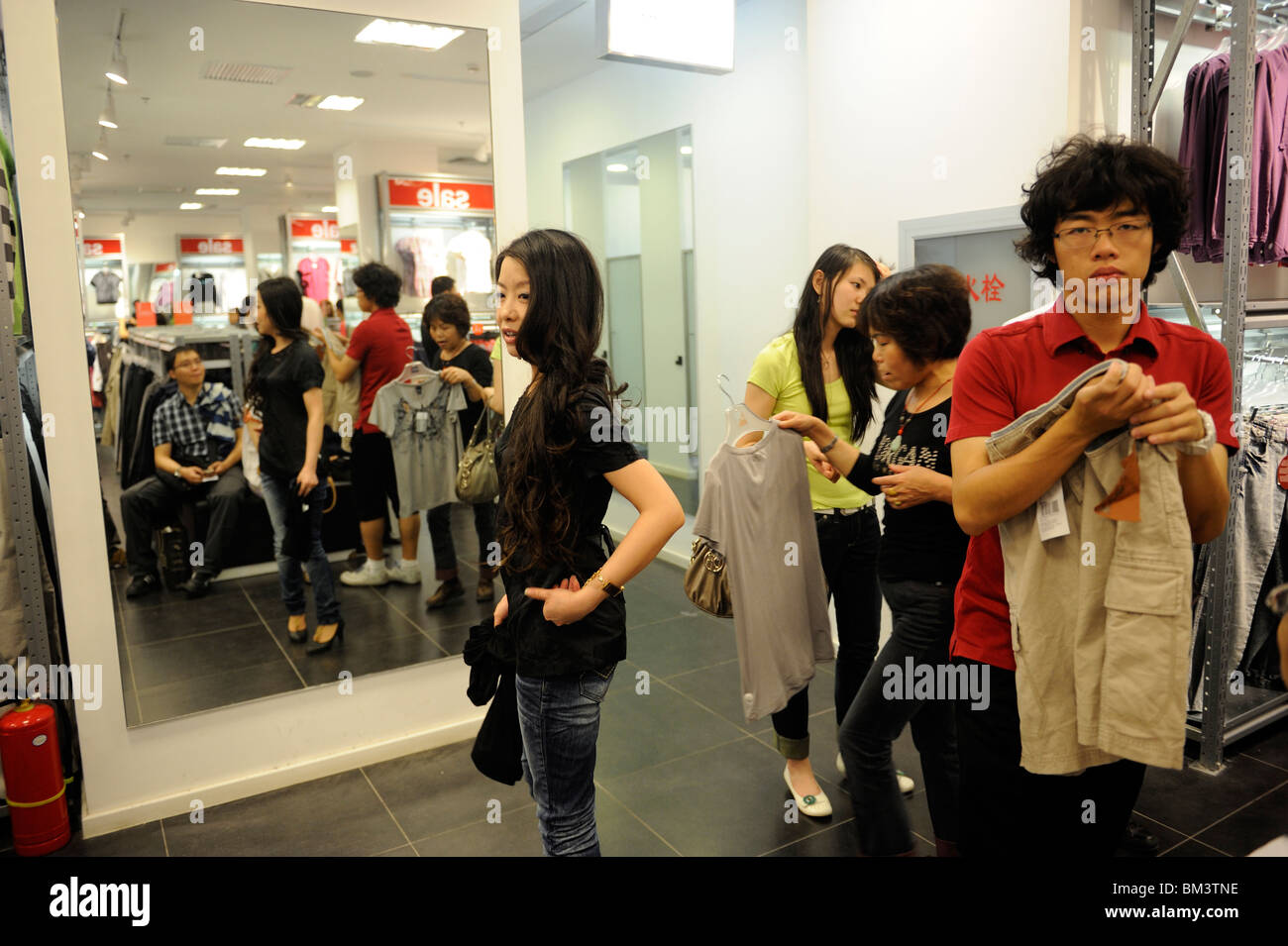 Chinese shopping at an Esprit store at Beijing Scitech Premium Outlet ...
