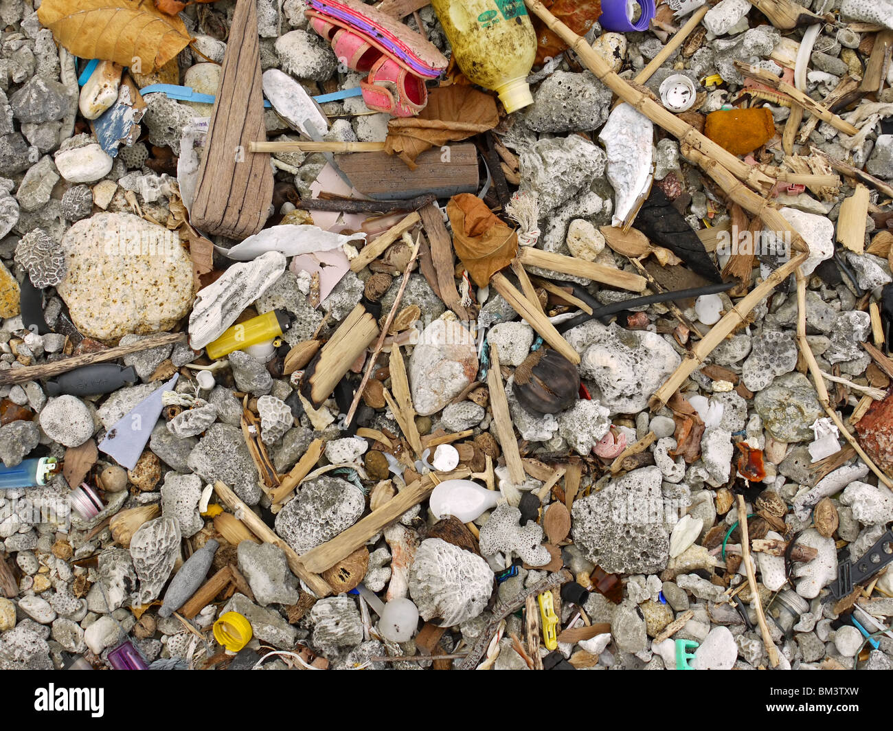 Plastic trash on seashore vertical hi-res stock photography and images ...