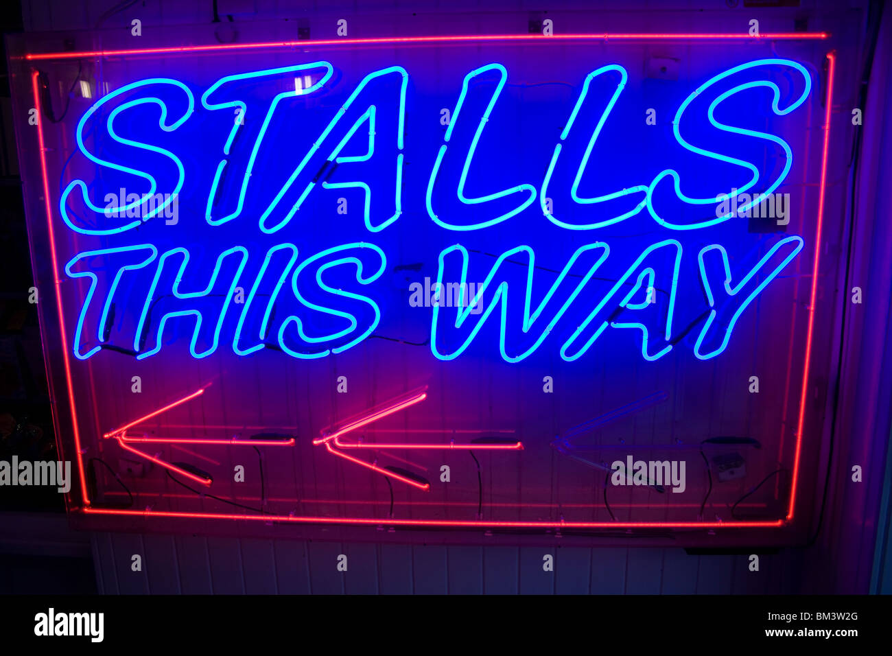 Neon blue 'stalls this way' sign at Camden Markets, London, UK Stock ...
