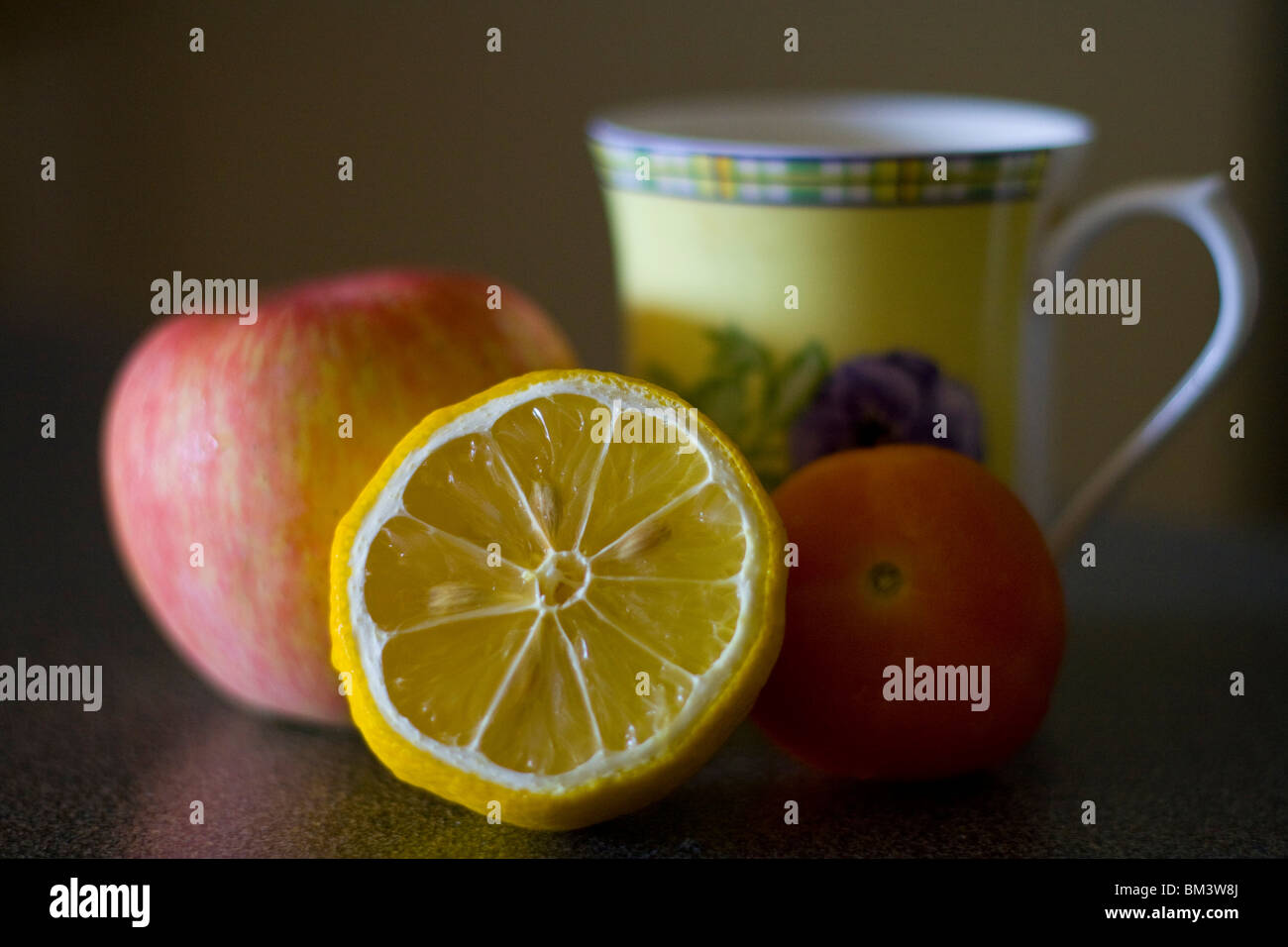 Still life with mug and fruit Stock Photo - Alamy