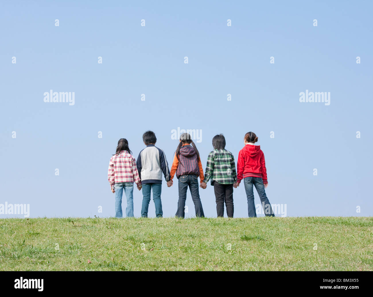 Boys and Girls Holding Hands Stock Photo - Alamy