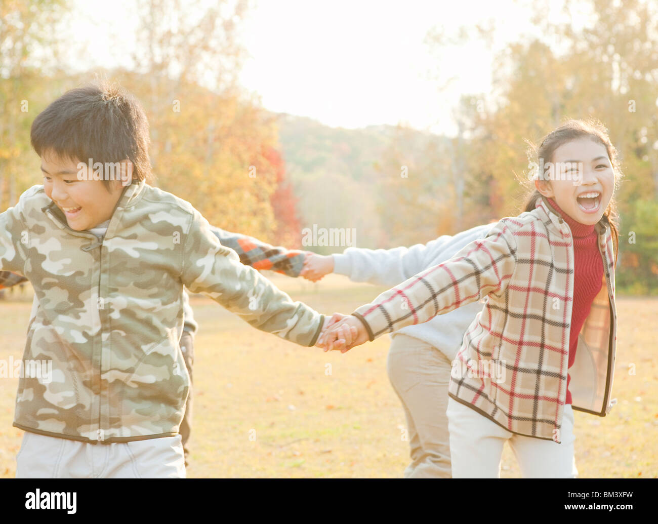 Friends playing together Stock Photo - Alamy