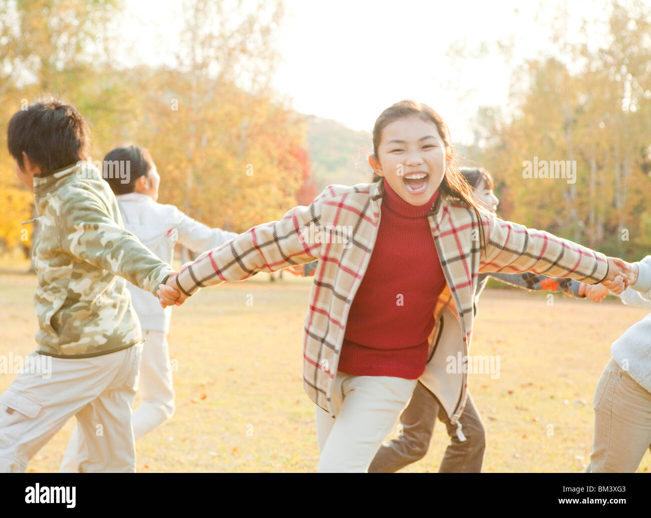 Friends playing together Stock Photo - Alamy